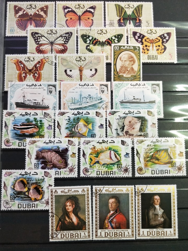 Dubai Small collection of 54 different stamps 2 pages as shown | eBay