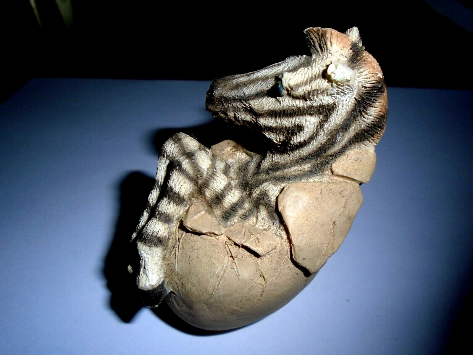 Artesania Rinconada Style 3.5" Zebra Figurine sitting in a cracked egg ...
