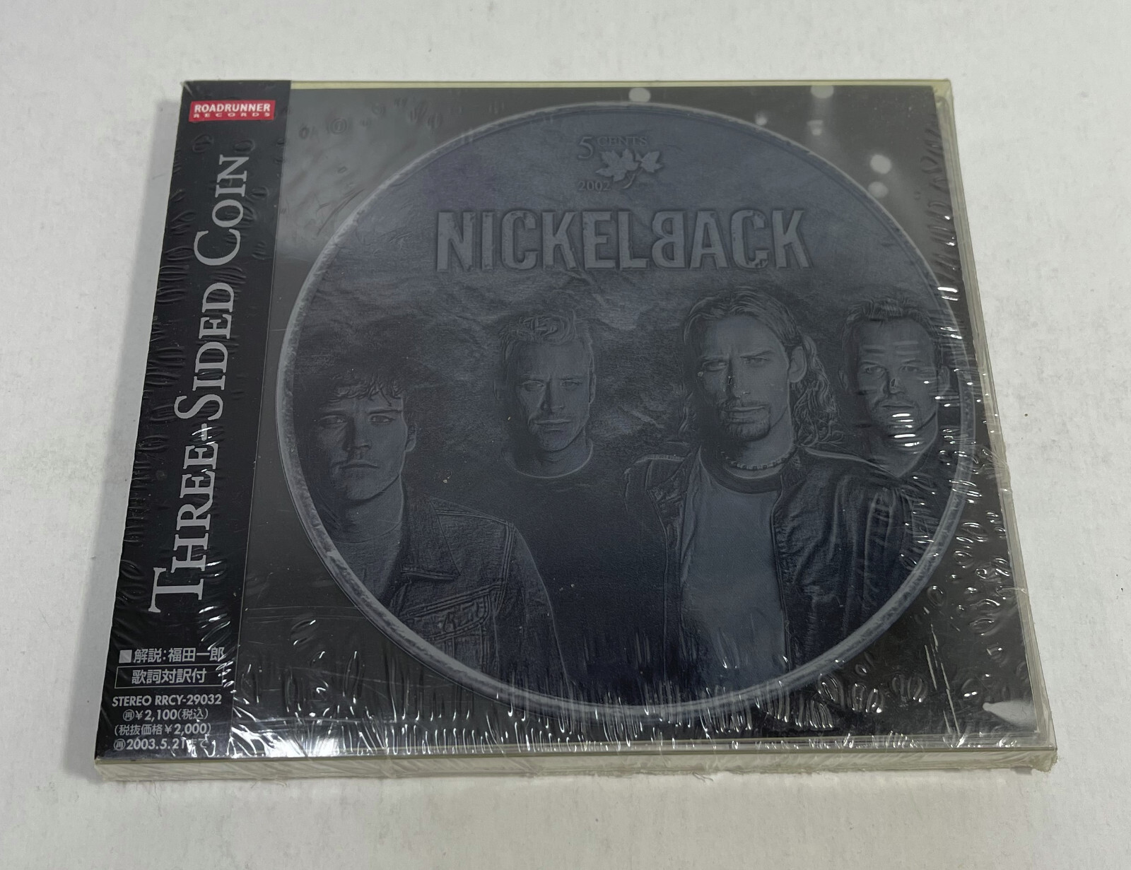 Three Sided Coin [IMPORT] by Nickelback (May-2002, Rock Records) for ...