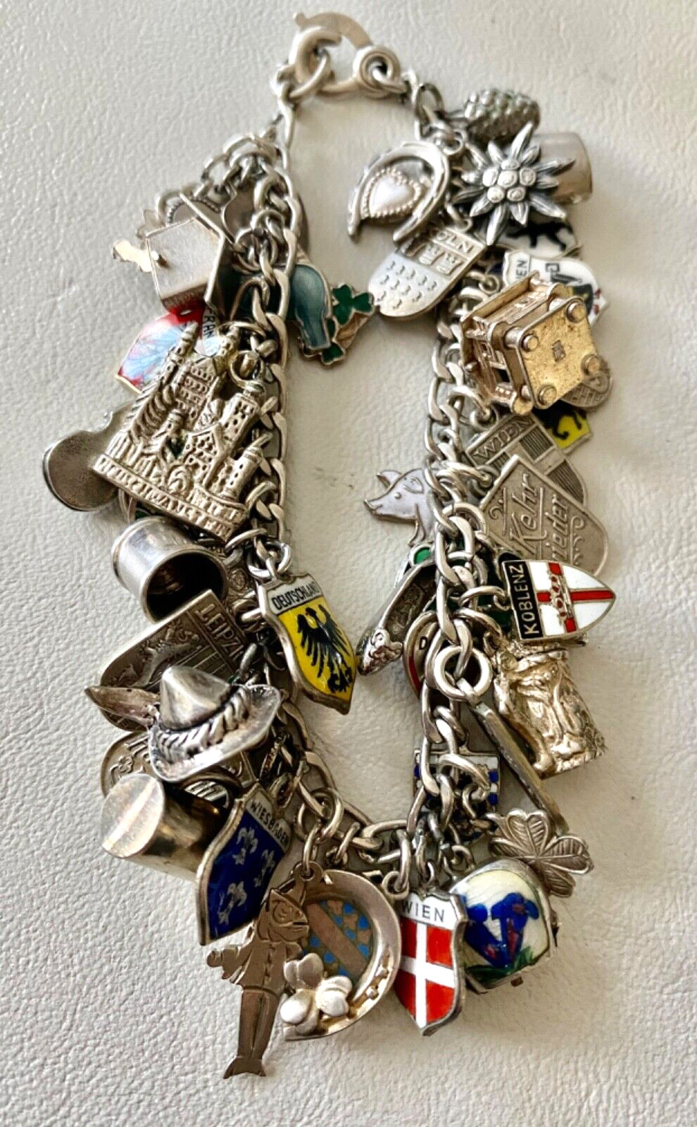 52 Antique Sterling German Travel Charms Bracelet Hea… - Gem