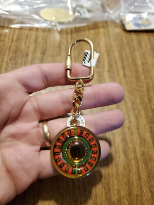 Vtg Gold Tone & Enamel Spinning Roulette Shaped Souvenir Keychain | eBay