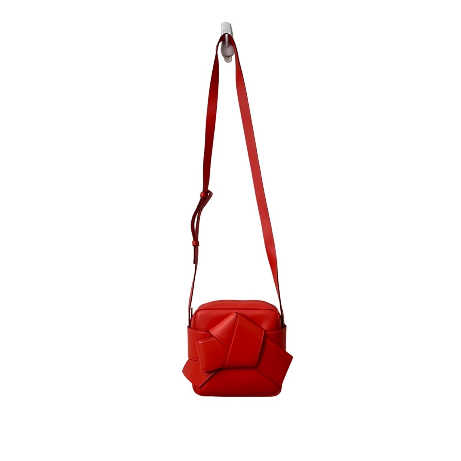 Acne Studios Musubi Knot Bow Leather Coral Camera Bag… - Gem