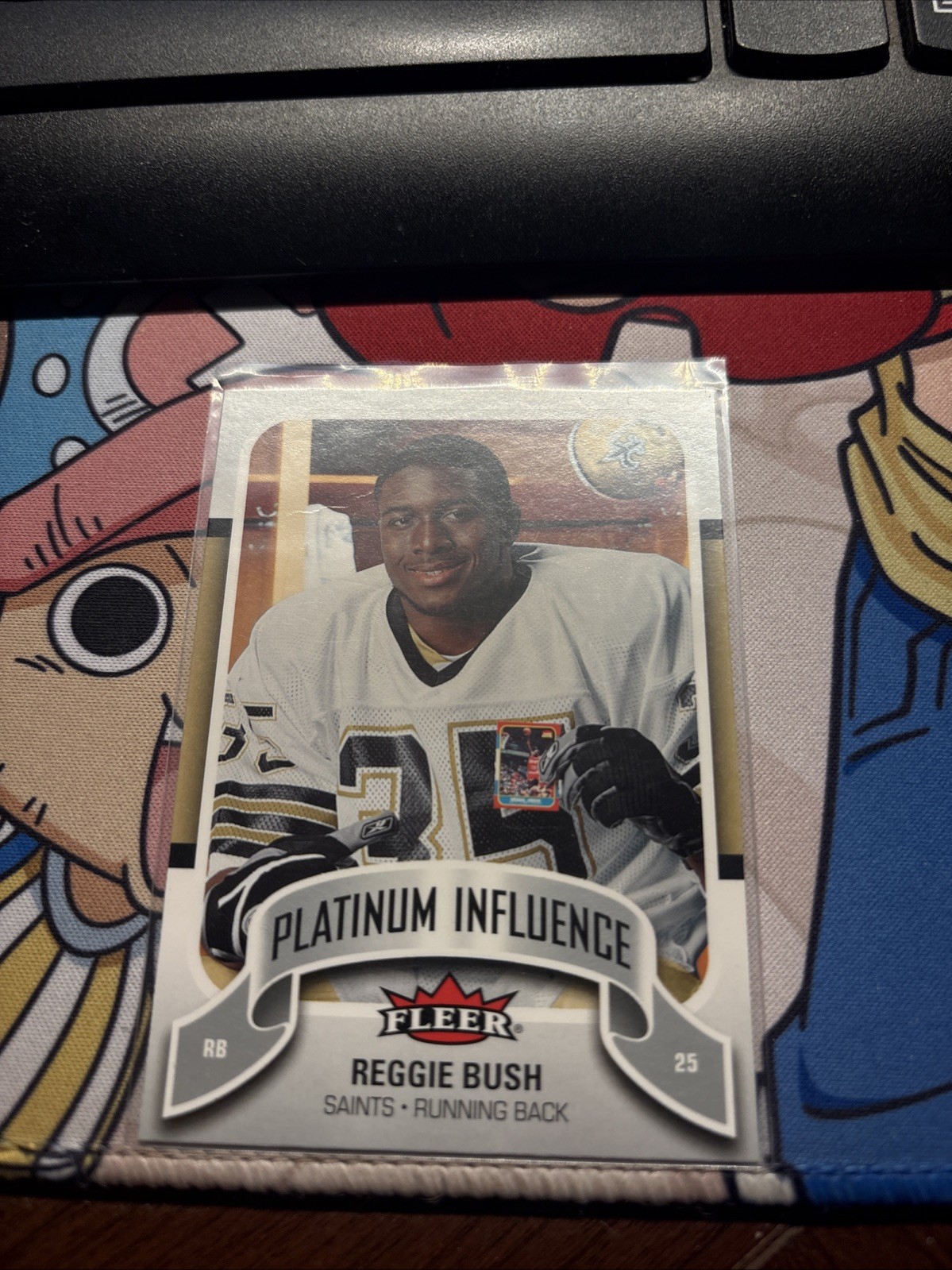 2006-07 Fleer Platinum Influence Reggie Bush holding MICHAEL JORDAN ...