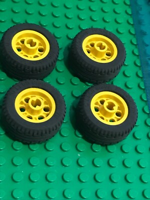 Lego A set of 4 x Yellow Hub Technic Wheels 30.4 x 14 VR with Black ...
