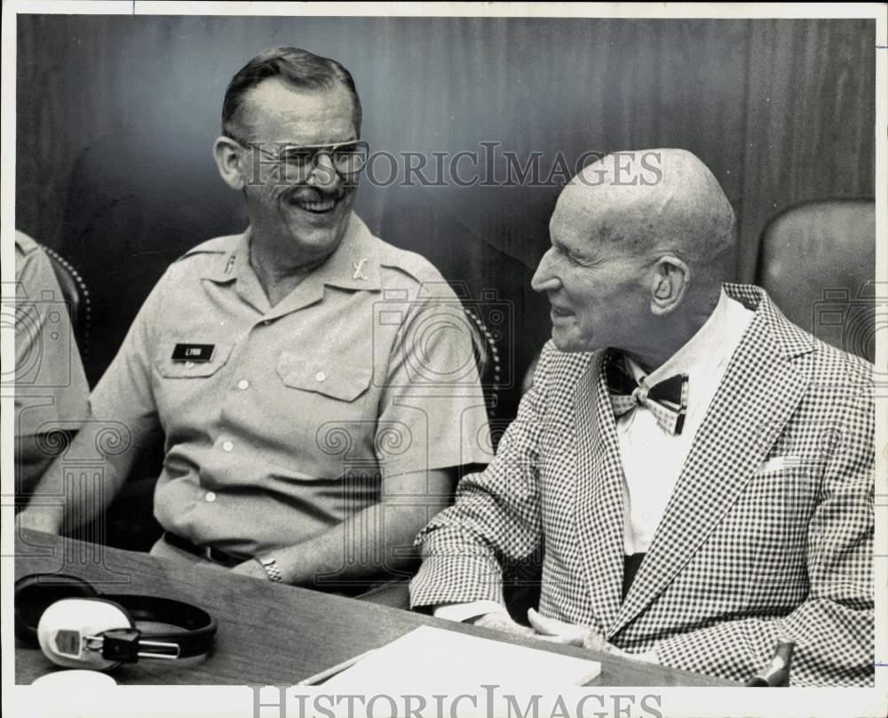 Press Photo Colonel W.J. Lynn, General William Simpson laugh together ...