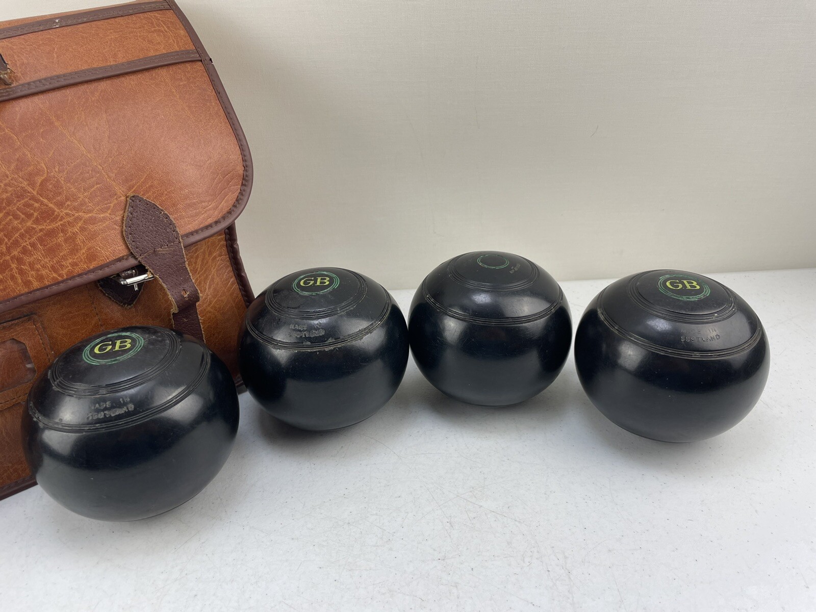 SET THOMAS TAYLOR OF GLASGOW LIGNOID `NO 3 BIAS BOWLS WITH BROWN BUCKLE ...