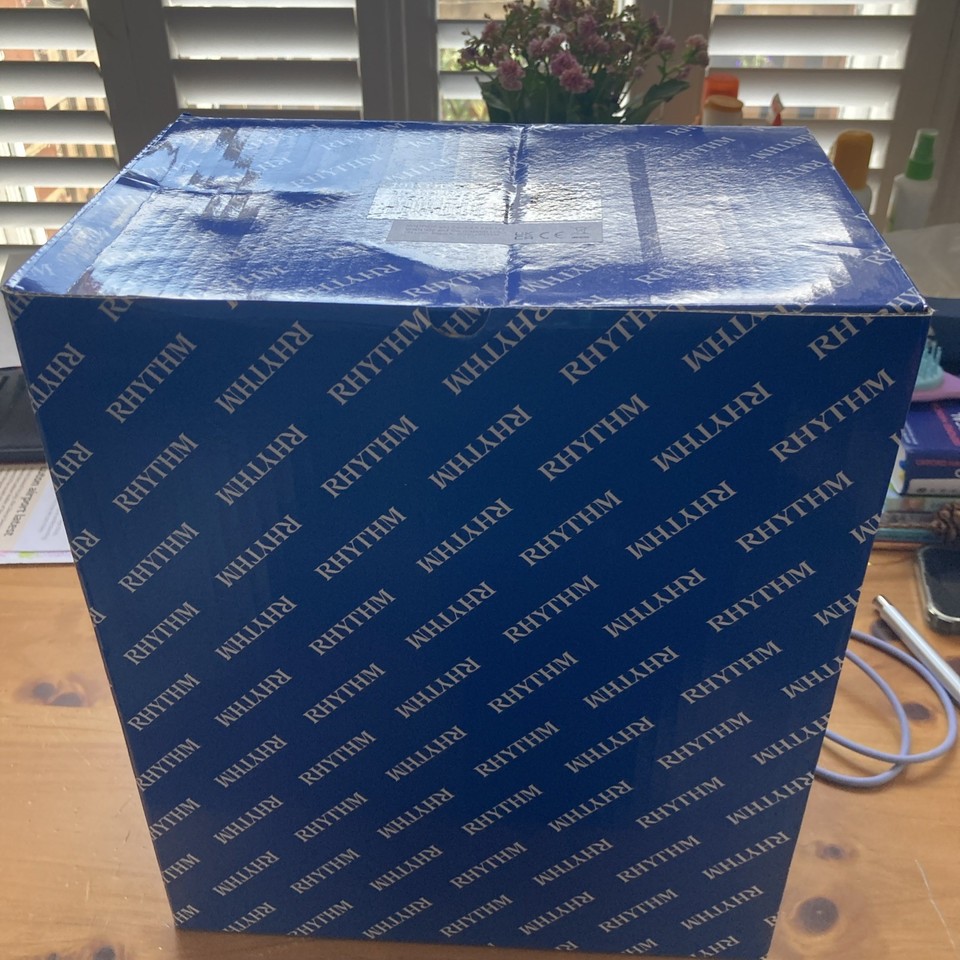 Rhythm Clock "Crystal Dulcet II" Musical Motion Mantle Clock Wood Grain ...