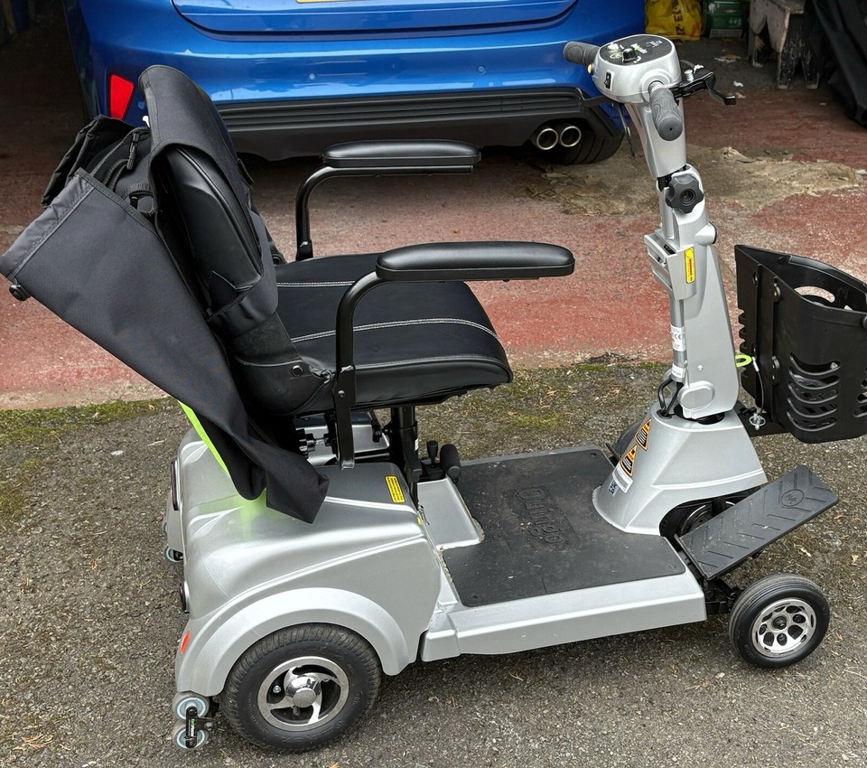 Quingo Ultra Mobility Scooter and charging box,, and rear bags | eBay UK