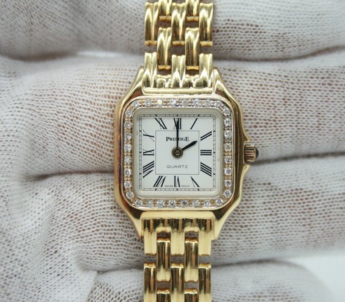 LADIES PRESTIGE 14K YELLOW GOLD QUARTZ SWISS MADE DIAMOND BEZEL 23MM ...