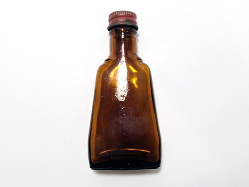 VINTAGE BROWN GLASS MCCORMICK BOTTLE SMALL JAR KITCHEN DECOR FARMING ...