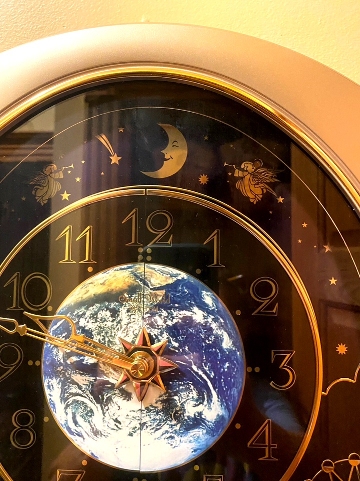 Rhythm Clock "Peaceful Cosmos" Magic Motion Wall Clock | eBay