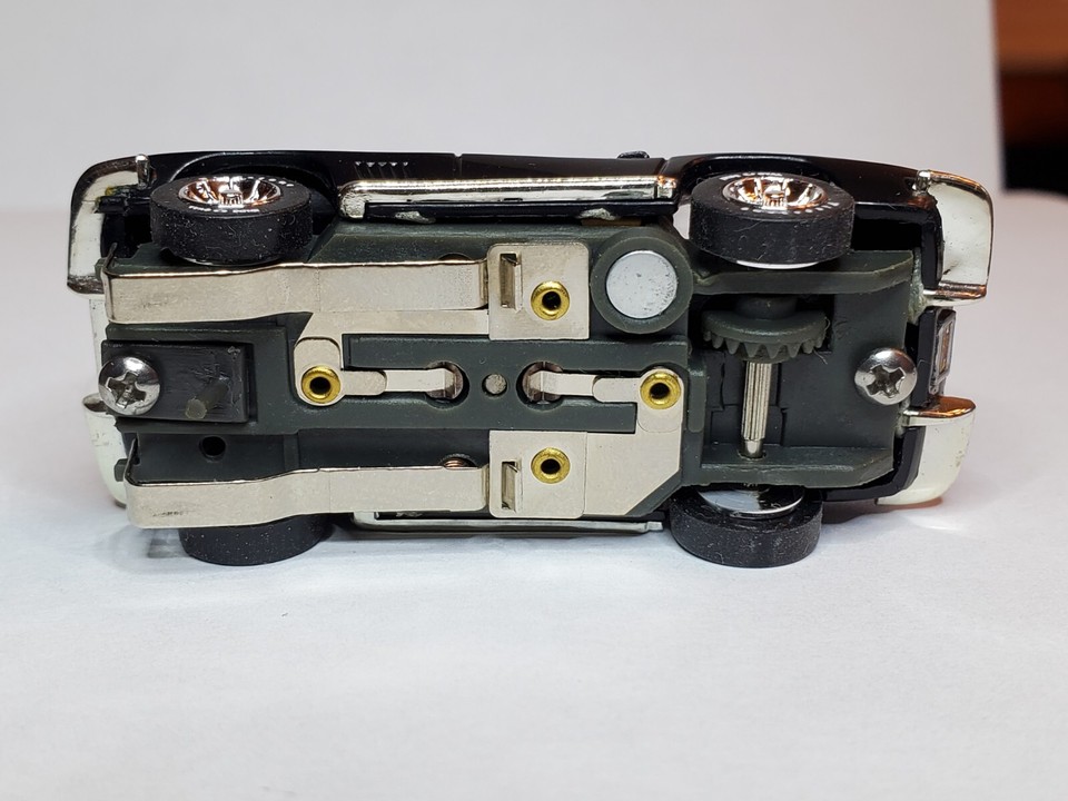 67 CORVETTE BLACK (HTF) HO SLOT CAR, ULTRA G CHASSIS, lettered tires ...