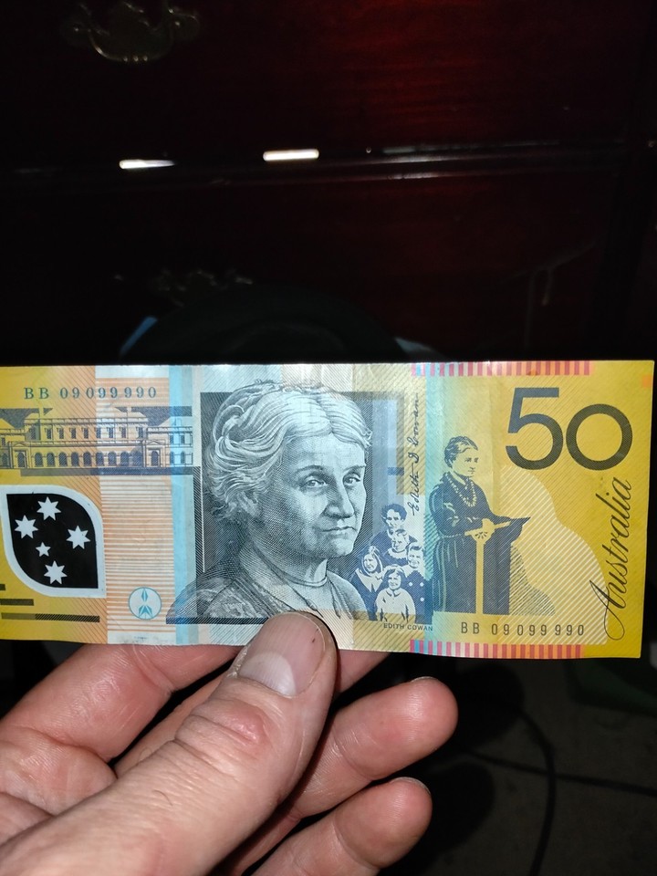 Australian currency, $50 note value, with consecutive serial number ...