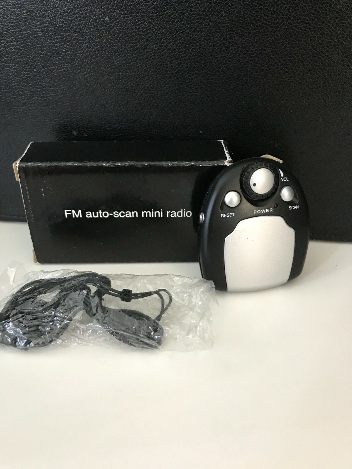 FM auto-scan mini radio uses 2 AAA W/ belt clip (Batteries not included ...