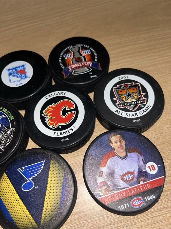 Lot Of 9 NHL Official Logo Hockey Pucks, Multiple team puck | eBay