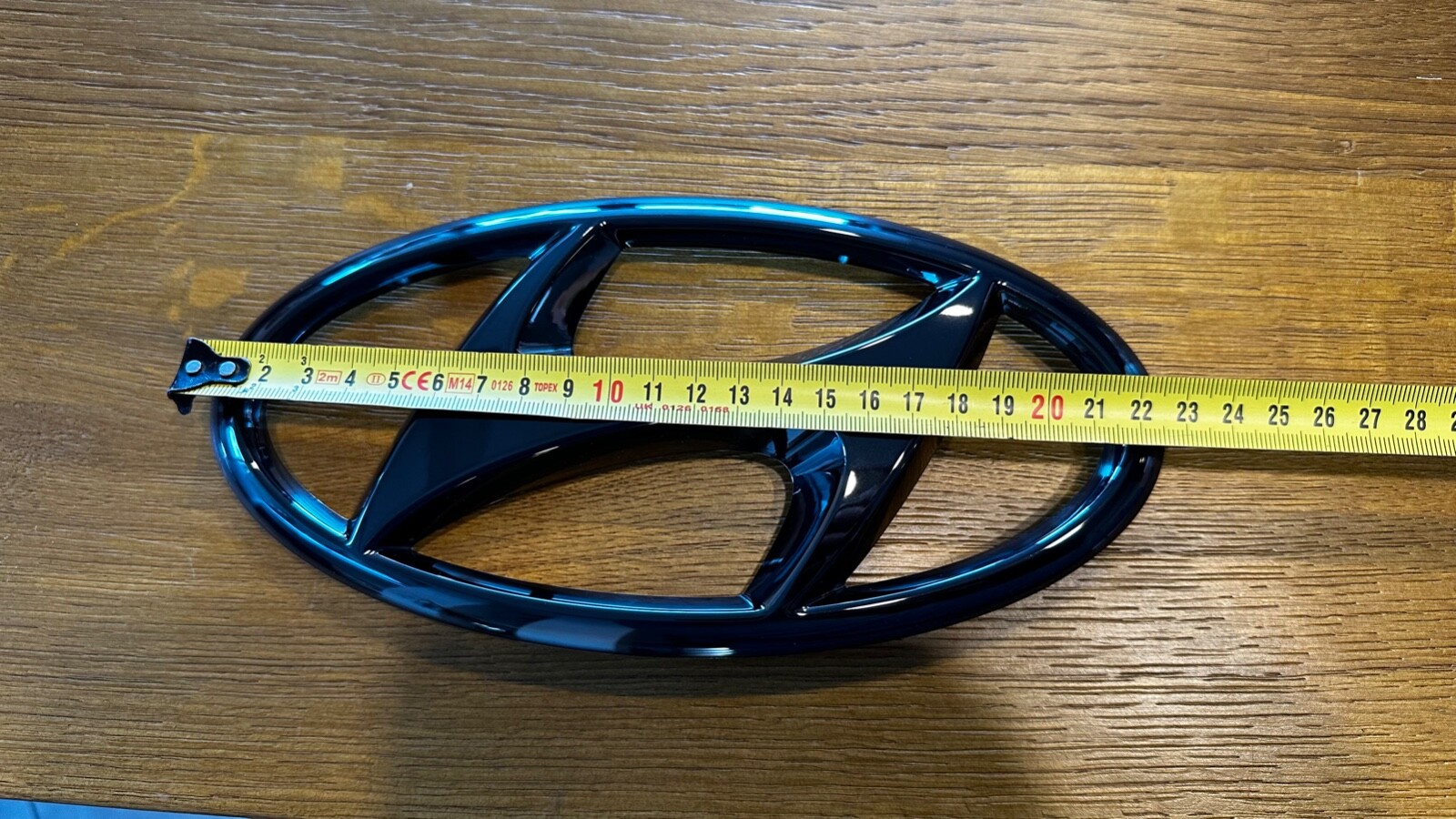 GENUINE HYUNDAI TUCSON NX4 2020- FRONT GRILLE BADGE 86300-N9010 | eBay