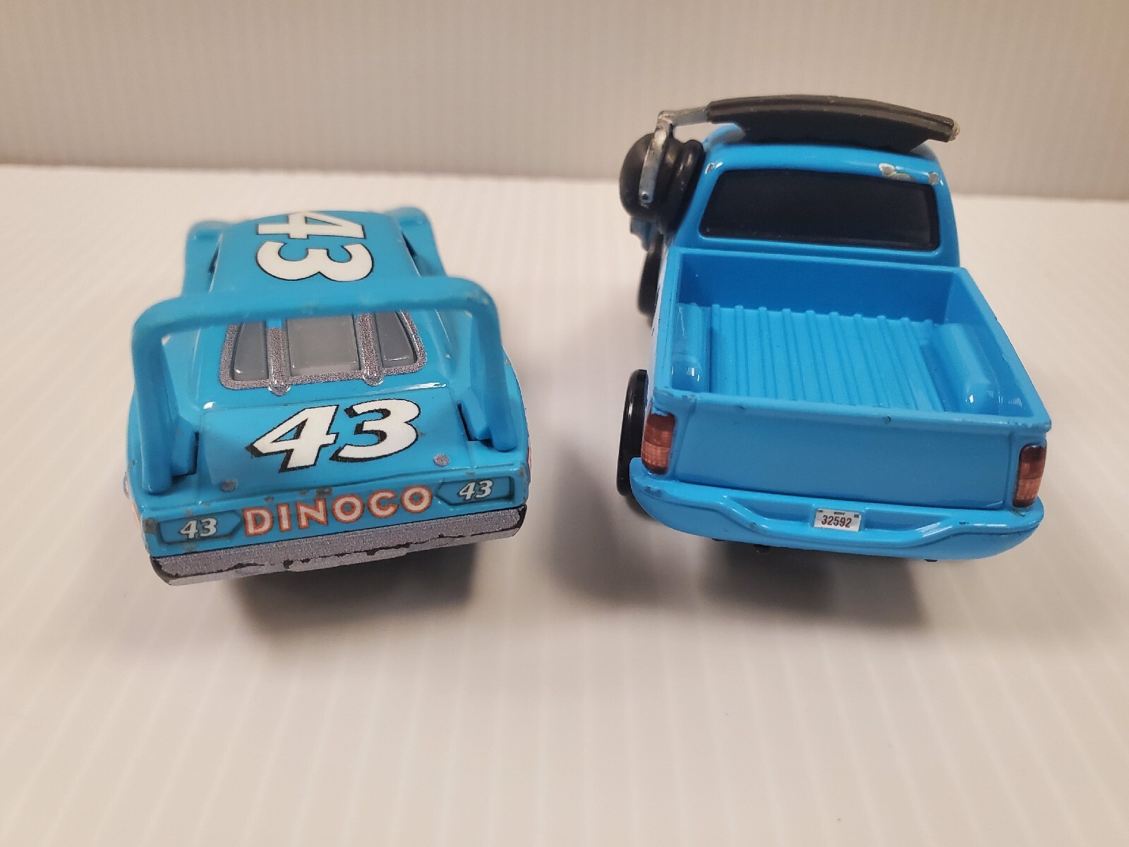 Disney Pixar Cars Dinoco Crew Chief Roger Wheeler & Strip Weathers Toy ...