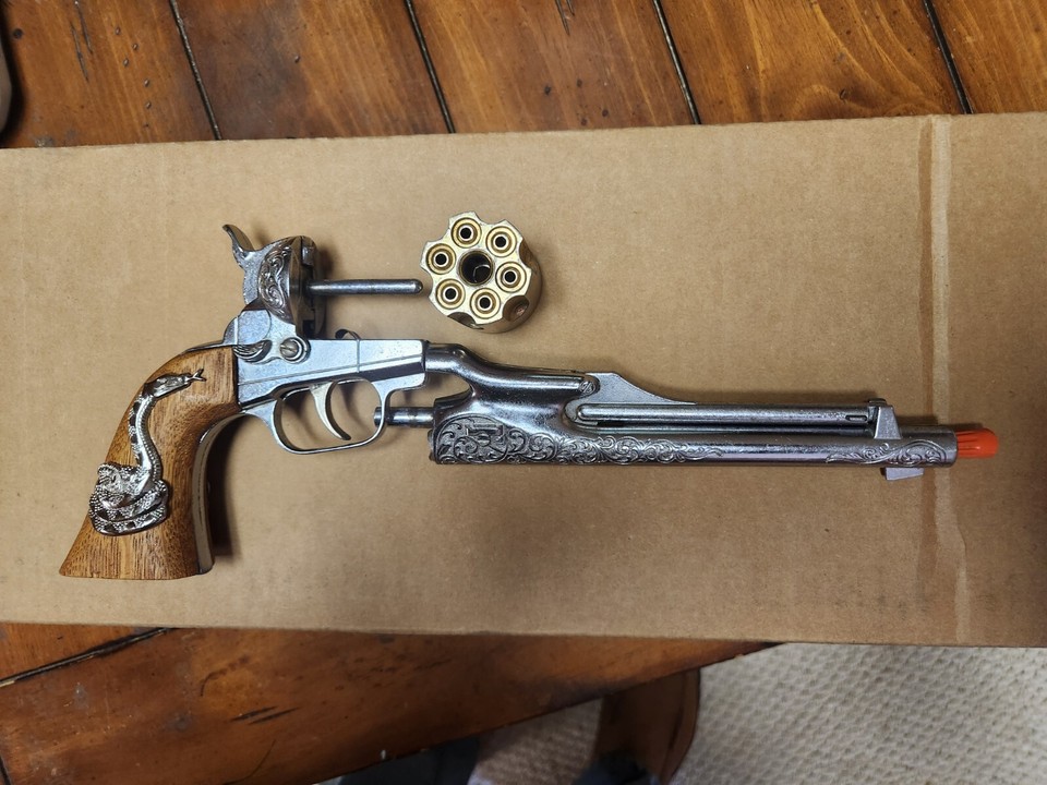 Vintage Hubley Colt 45 cap gun with Rattlesnake Wooden Grips | eBay