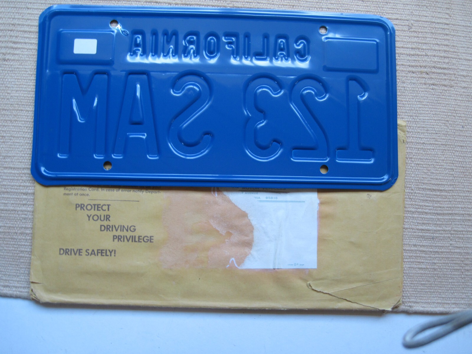 1970 s California Sample license plate with DMV folder.123 SAM. | eBay