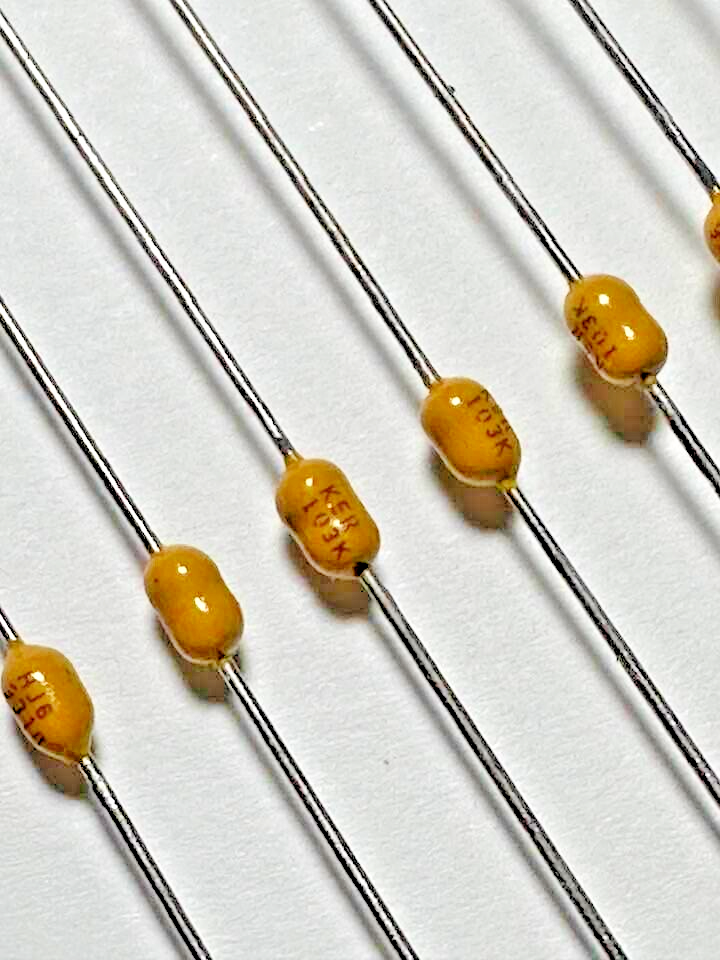 100X - .01uF @ 50V 10% X7R - "KEMET C410C103K5R5CA" CERAMIC AXIAL MLCC ...