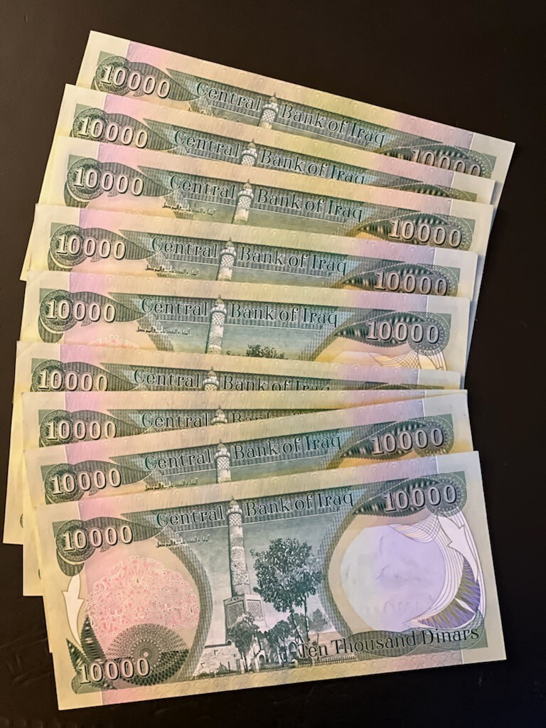 40,000 IQD, new crisp Uncirculated Iraq dinar banknotes. 4 x 10,000 ...