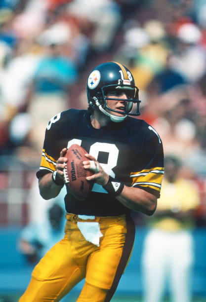 Quarterback Cliff Stoudt of the Pittsburgh Steelers looks to pas- 1983 ...