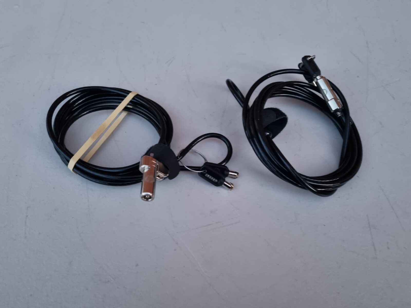 Joblot of 2 HP Nano Master Keyed Cable Lock 1AJ39AA. Joblot of 2 ...