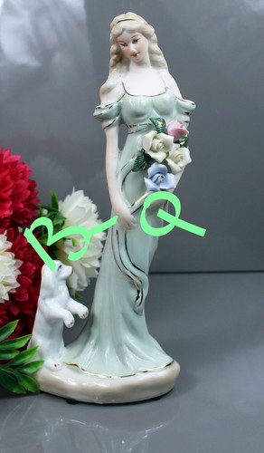 Madame Posh Lady Figurines wearing a pale green dress with hold ...