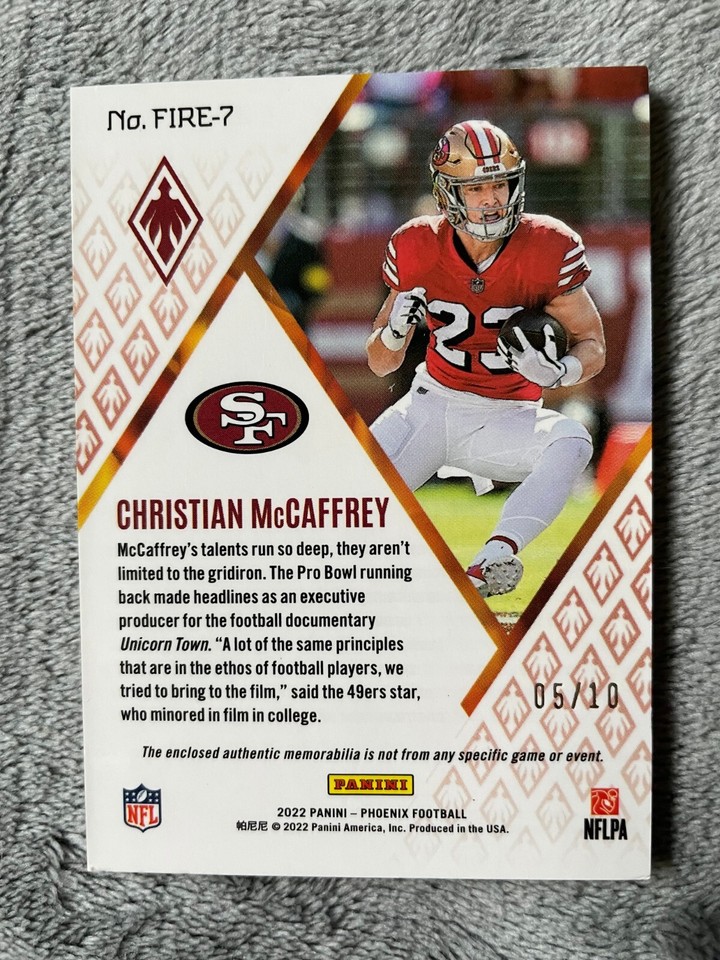 Christian McCaffrey #Fire-7 - 2022 Panini Phoenix - Fire Fabrics Prime ...