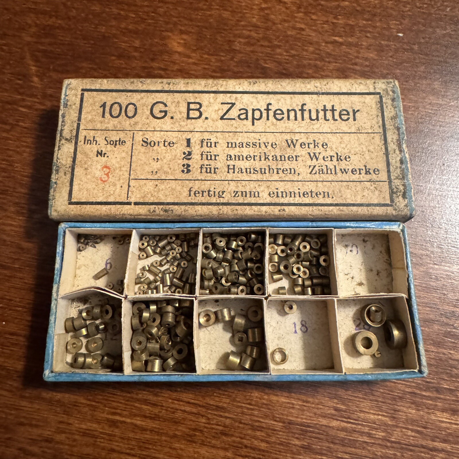 Vintage Watchmaker Tool Small Box of Brass Bushings 100 GB Zapenfutter ...