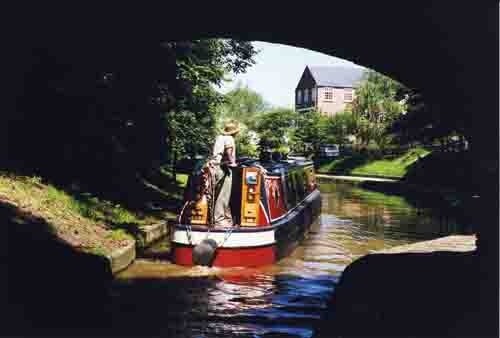Postcard of a narrowboat approaching Audlem mill on the Shropshire ...