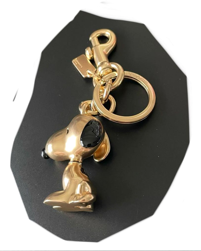 COACH PEANUTS Limited Edition Gold Snoopy Keychain Ba… - Gem