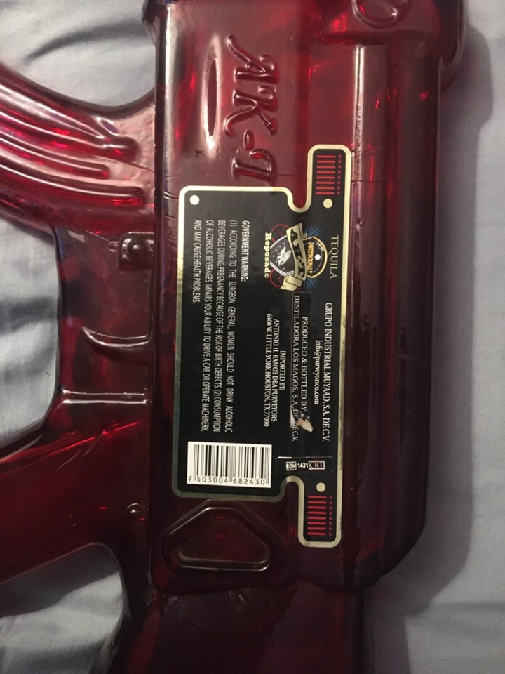 AK-T TEQUILA 21"x10" RED MACHINE GUN SHAPED BOTTLE | eBay