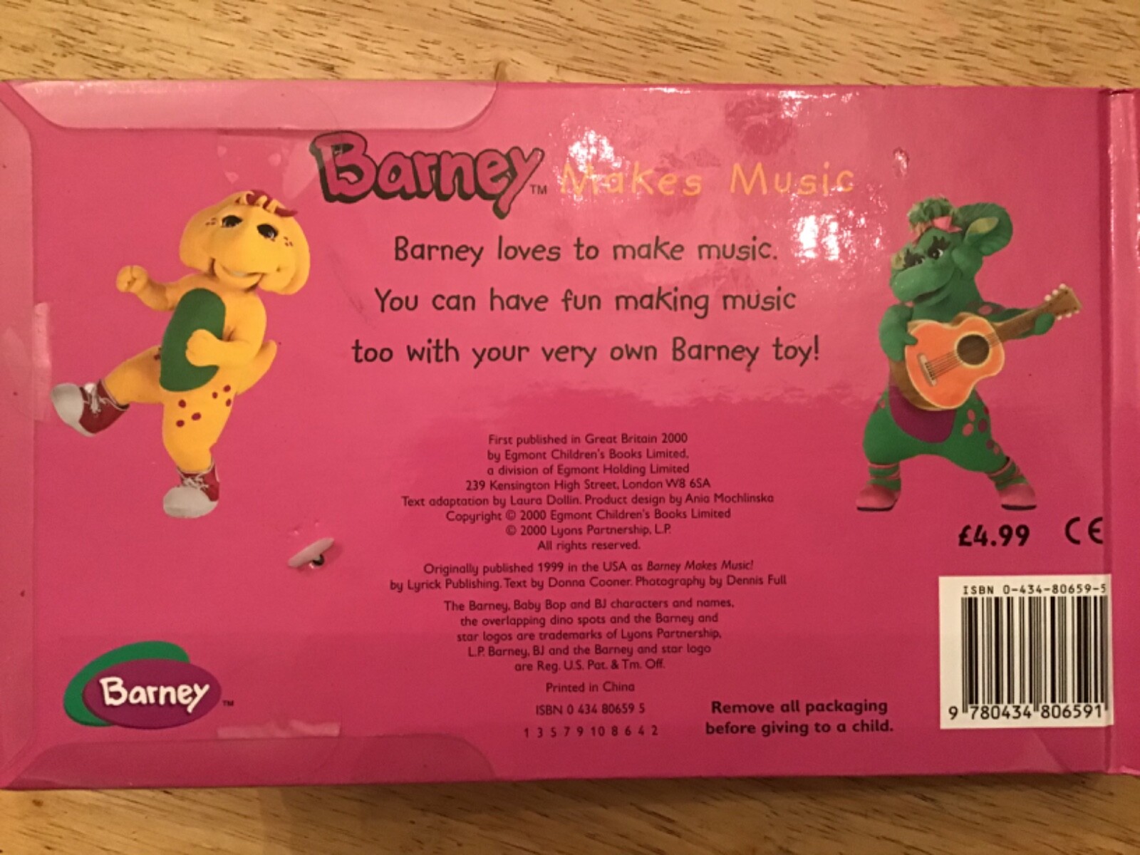 Barney the dinosaur makes music with small barney plush year 2000 ...