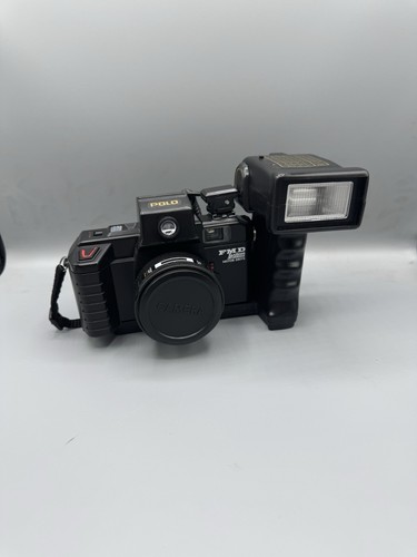 Polo FMD System Motor Drive 50mm Camera W/ Books And Large Camera Bag ...