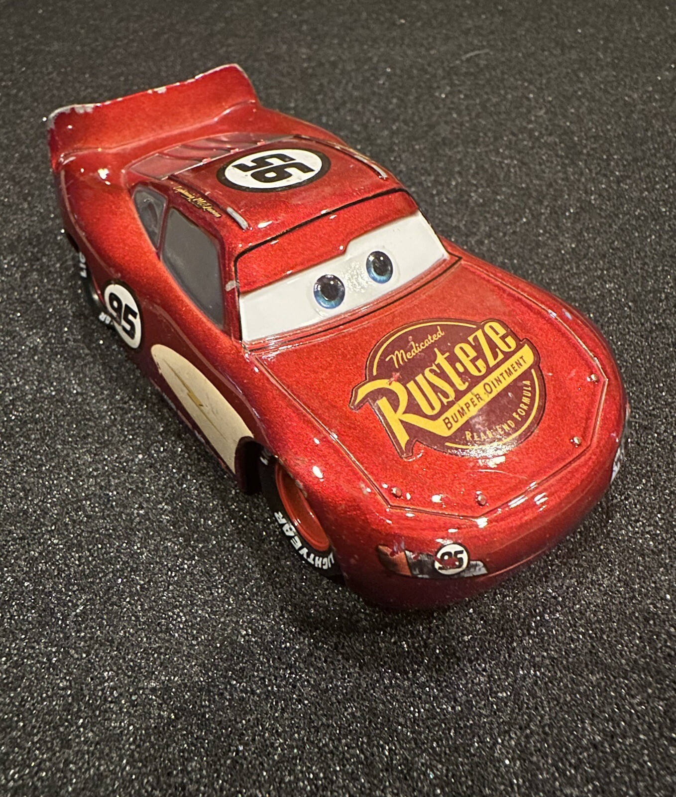 Disney Pixar Cars Lightning McQueen Rusteze Rust-eze Red 95 DieCast Car ...