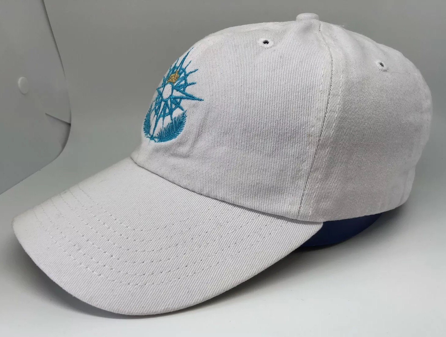 The Court Of Captivating Islands Cap Hat Adult Adjustable White 100% ...