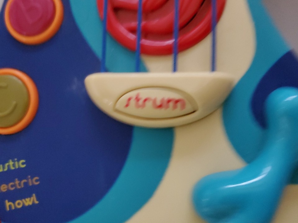 B. Woofer Hound Dog Guitar Battat Toys Strum B Dog Musical Learning ...