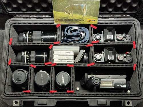 Black Nikon FM2n/FM2 kit with lenses, filters, straps, flash and ...