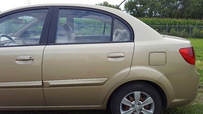 Gold Kia Rio 2006 Pictures