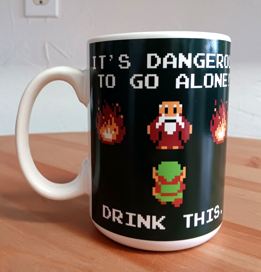 Legend Of Zelda Nintendo Coffee Mug 15 Oz It's Dangerous To Go Alone ...