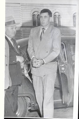 John Gilbert Graham Being Led in Handcuffs 1955 Photo - An unidentified ...