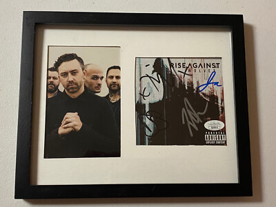 RISE AGAINST AUTOGRAPHED SIGNED WOLVES FRAMED CD COVER WITH JSA COA ...