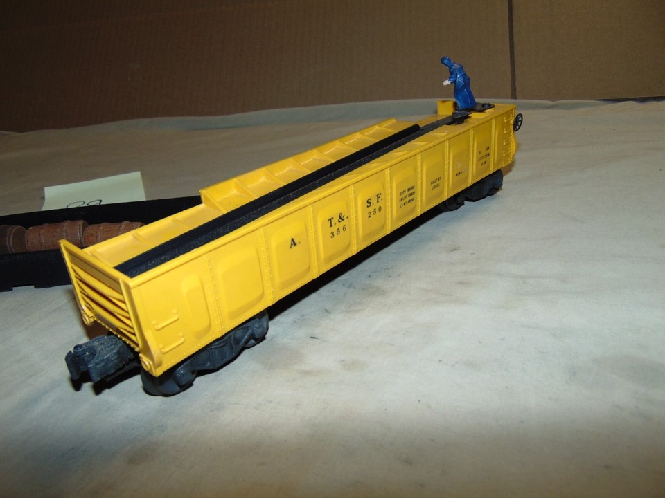 LIONEL O 3562-50 YELLOW SANTA FE OPERATING BARREL CAR WITH BARRELS ...
