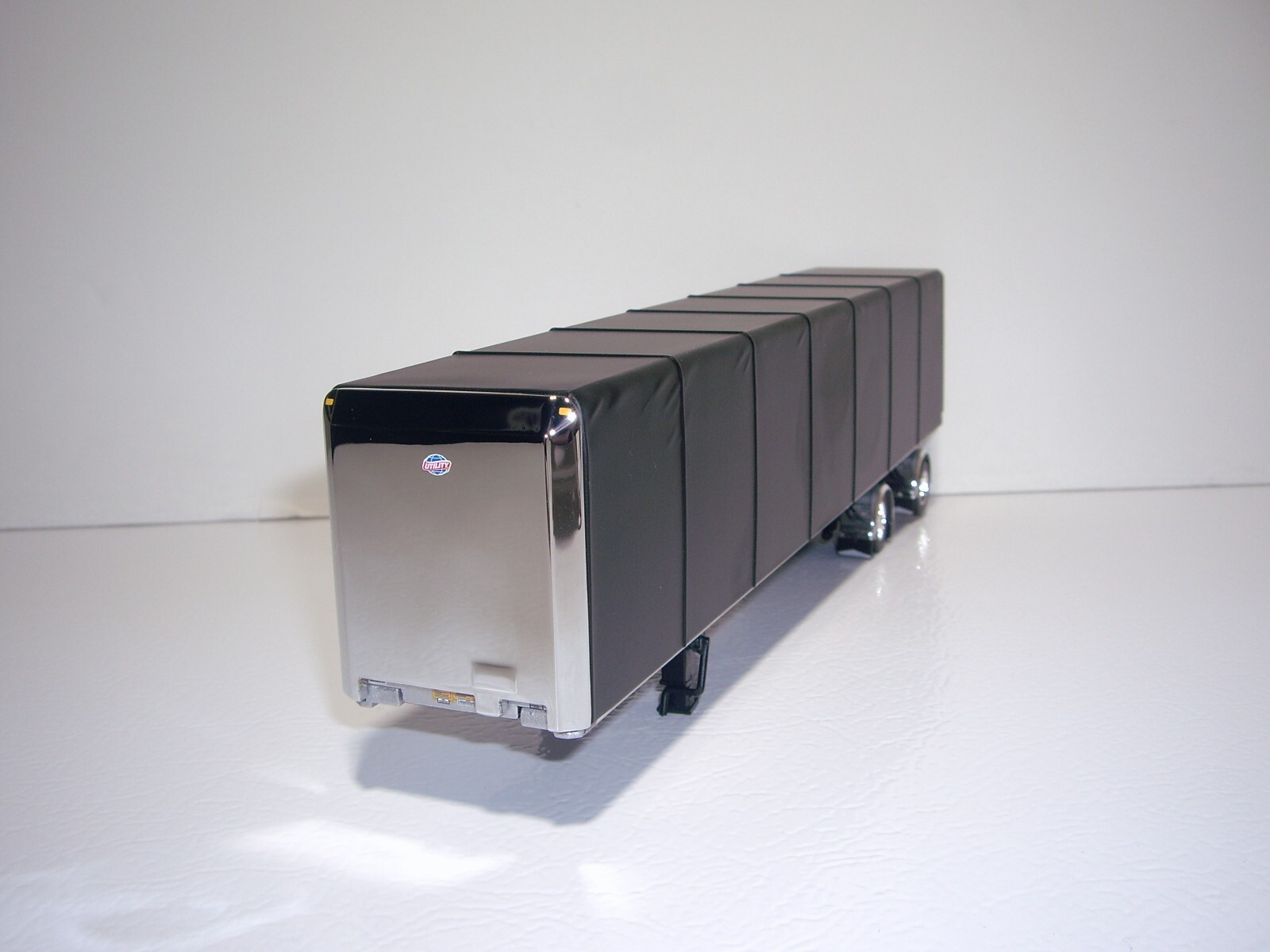 DCP FIRST GEAR 1/64 BLACK 53' UTILITY SPREAD AXLE SIMULATED ROLL TARP ...