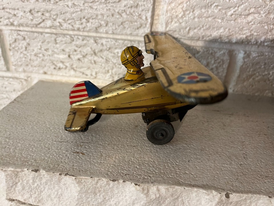 VINTAGE LOUIS MARX TIN WIND UP LOOPING ROLL OVER AIRPLANE. | eBay
