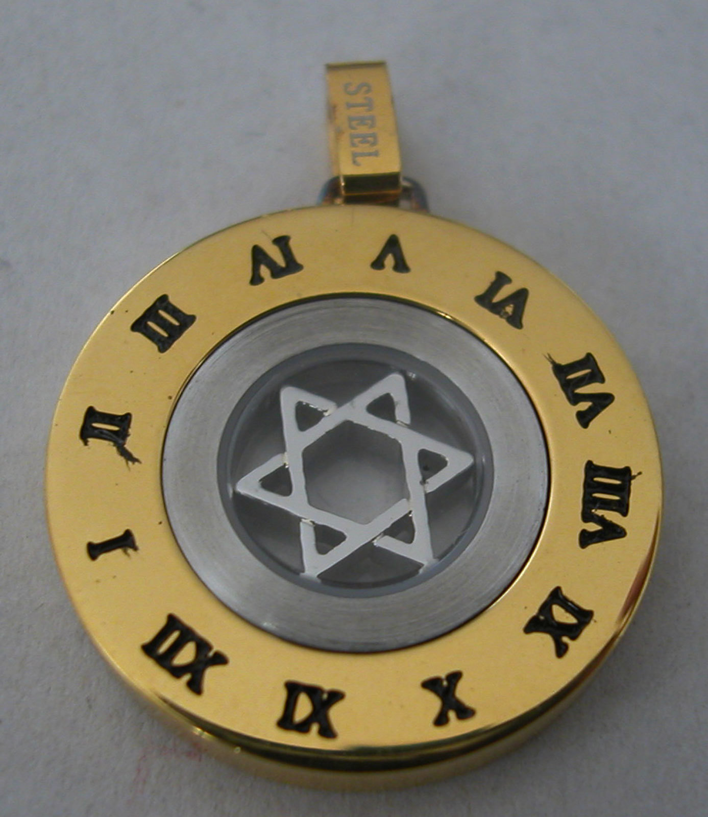 A Fine Kinetic Gold Plated Emboss Steel Pendant - In Center A Star Of ...