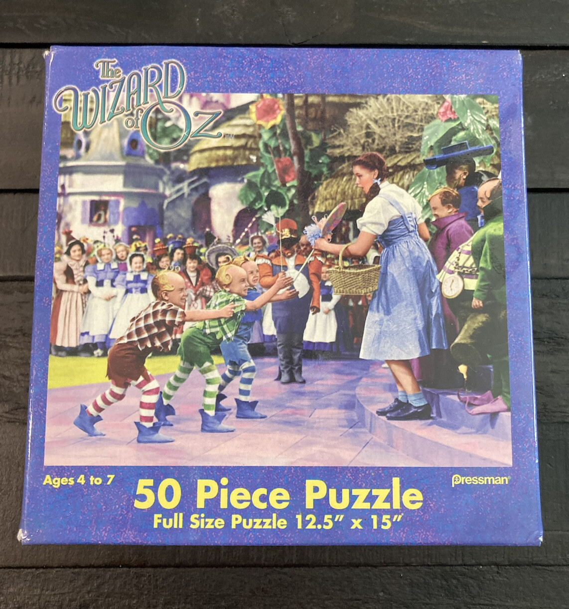 The WIZARD OF OZ 50 piece puzzle Dorothy Meets Munchkins Ages 4-7 2002 ...