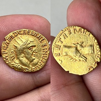 Ancient Roman Aureus gold coin with image of Roman emperor with a ...