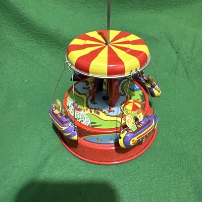 SCHYLLING ROCKET RIDE SPINNING CAROUSEL COLLECTOR SERIES WIND UP TIN ...